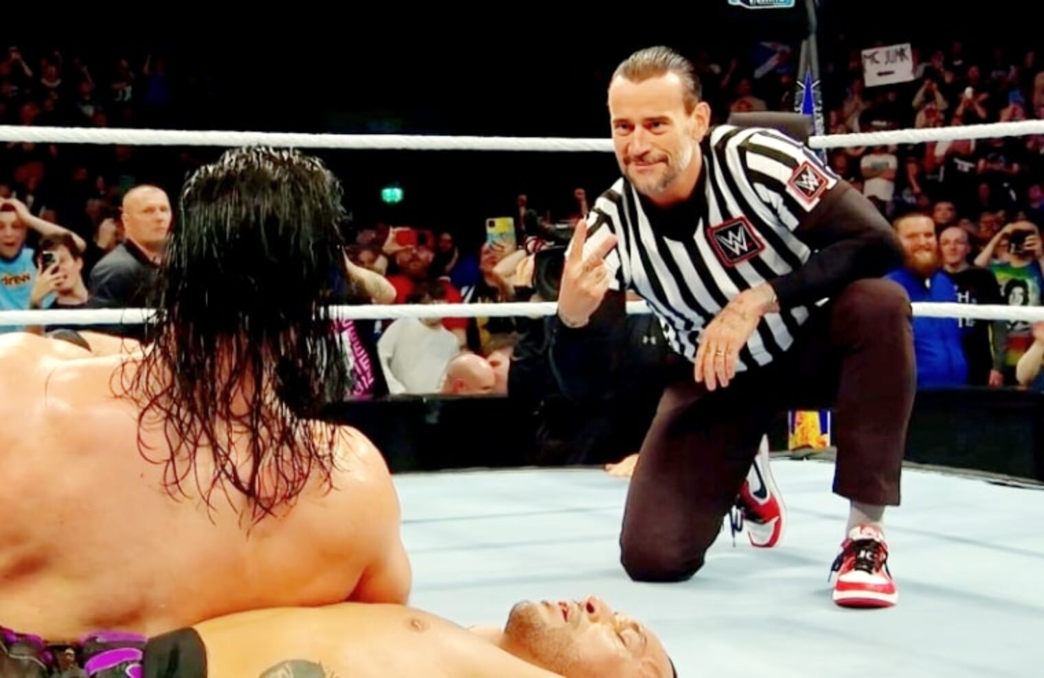 WWE Shares Backstage Footage To Explain How CM Punk Got A Referee Shirt ...