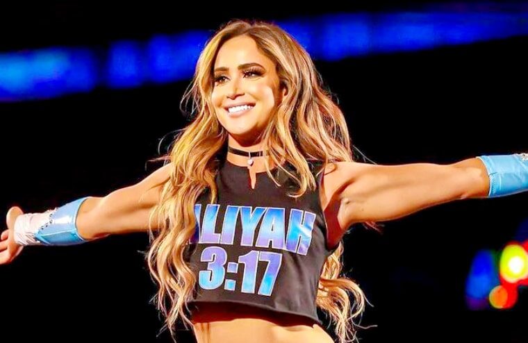 Former WWE Talent Aliyah Poses In Barely-There Bikini To Promote Her ...